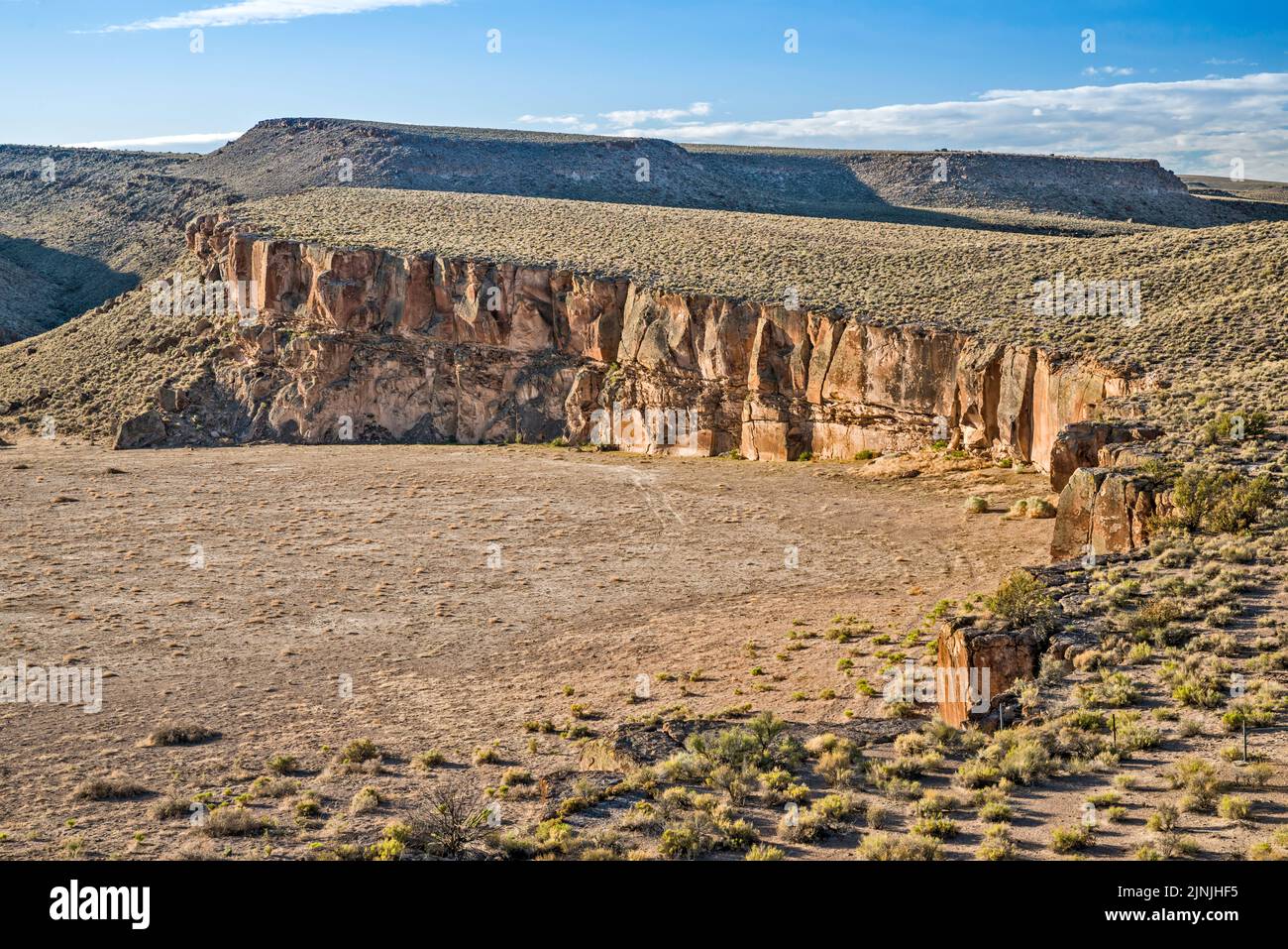Petroglyph site at tuff cliffs, view from SR 318 highway, White River ...