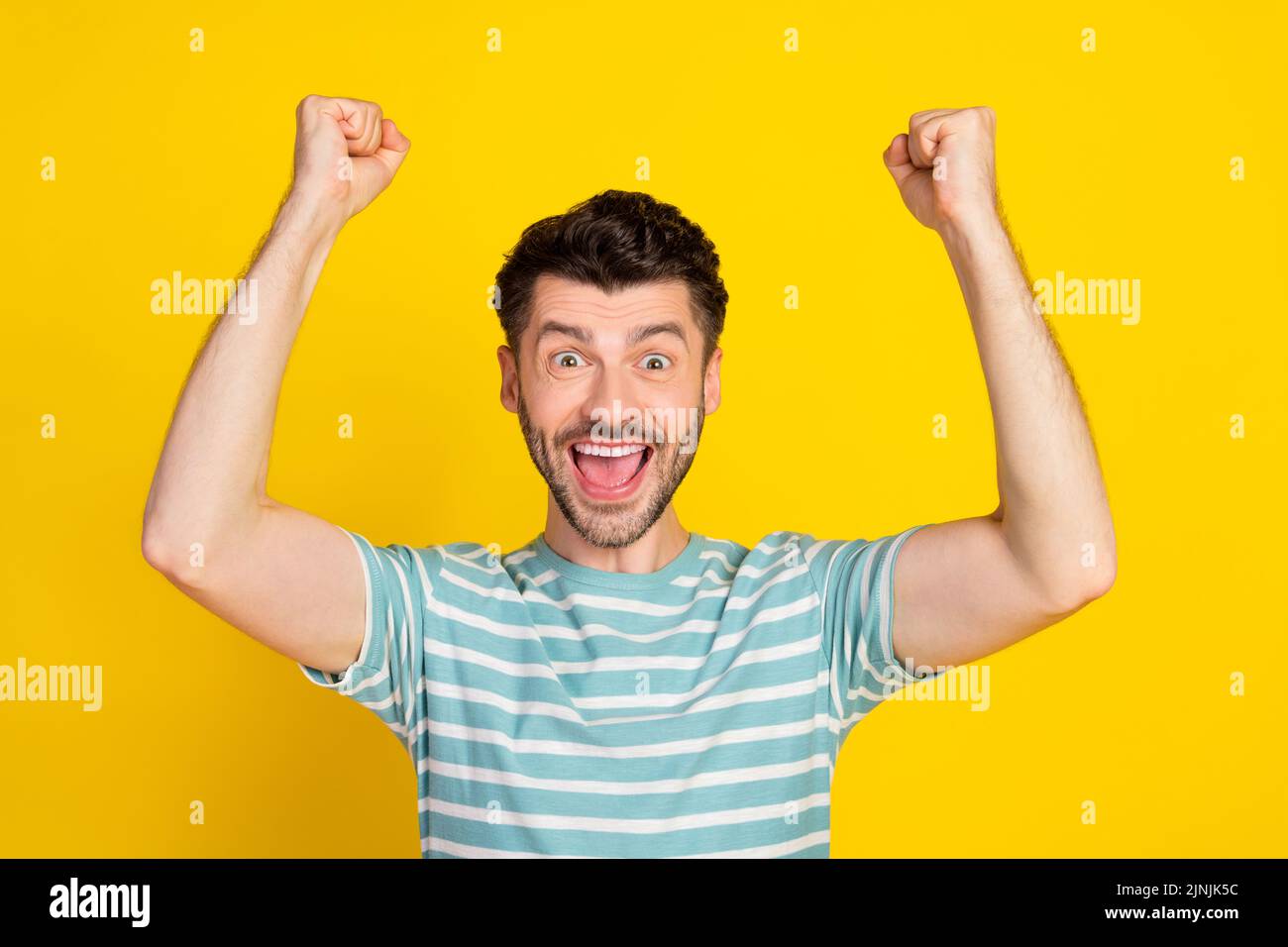 Closeup photo of young funny celebrating guy fan victory hooray win ...