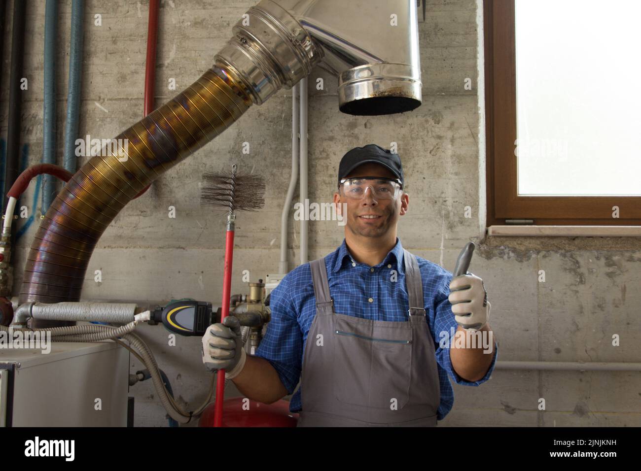 Maintenance cleaning fireplace after heating hi-res stock photography ...