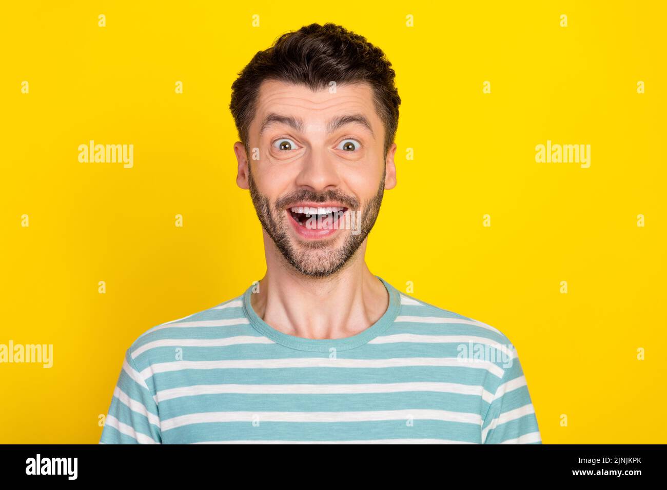 Closeup photo of young attractive guy smiling shock excited looking you ...