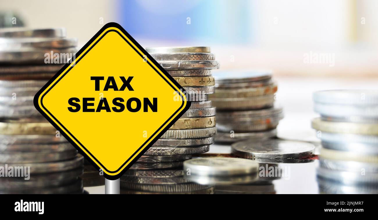 tax season sign on white background Stock Photo - Alamy