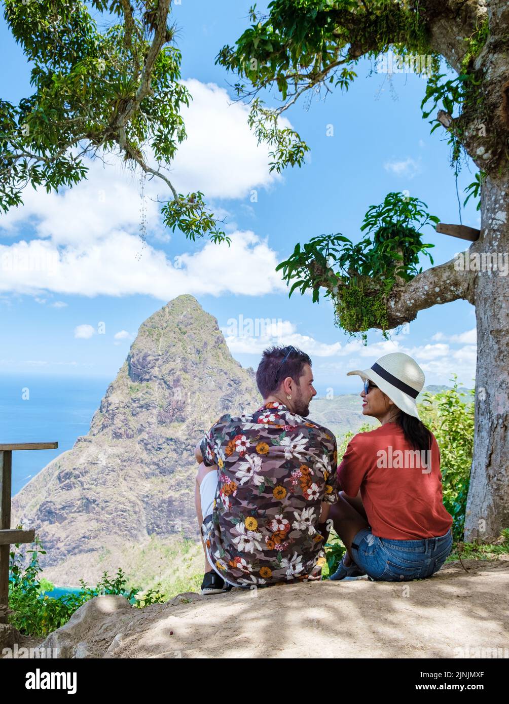 couple hiking in the mountains of Saint Lucia Caribbean, nature trail ...