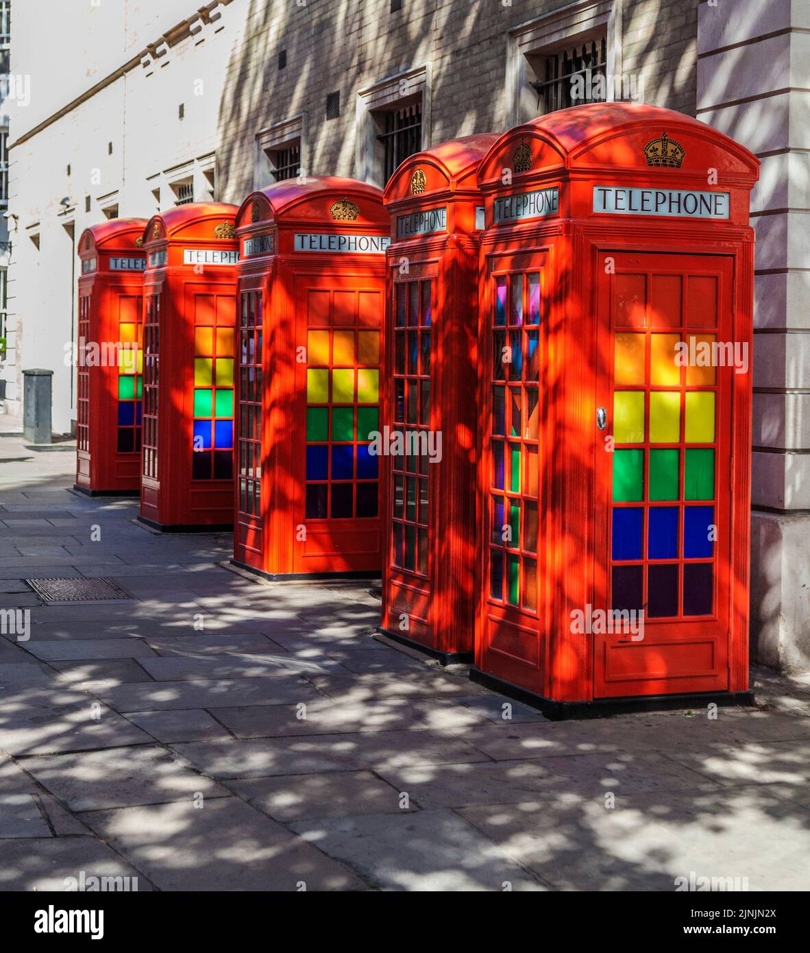 Red telephone boxes in Londons West End decorated in Gay Pride colours ...