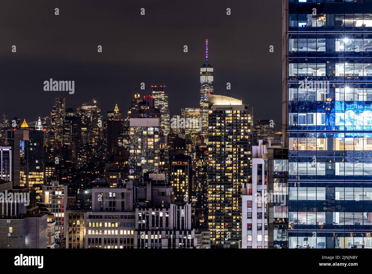 A beautiful shot of illuminated buildings in New York City at night ...