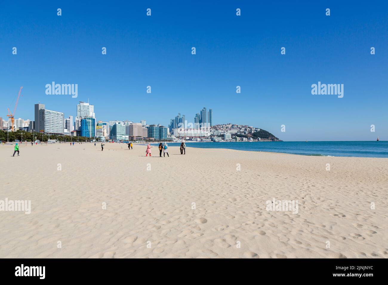 A view of the sandy Haeundae Beach with visitors in Busan, South Korea ...