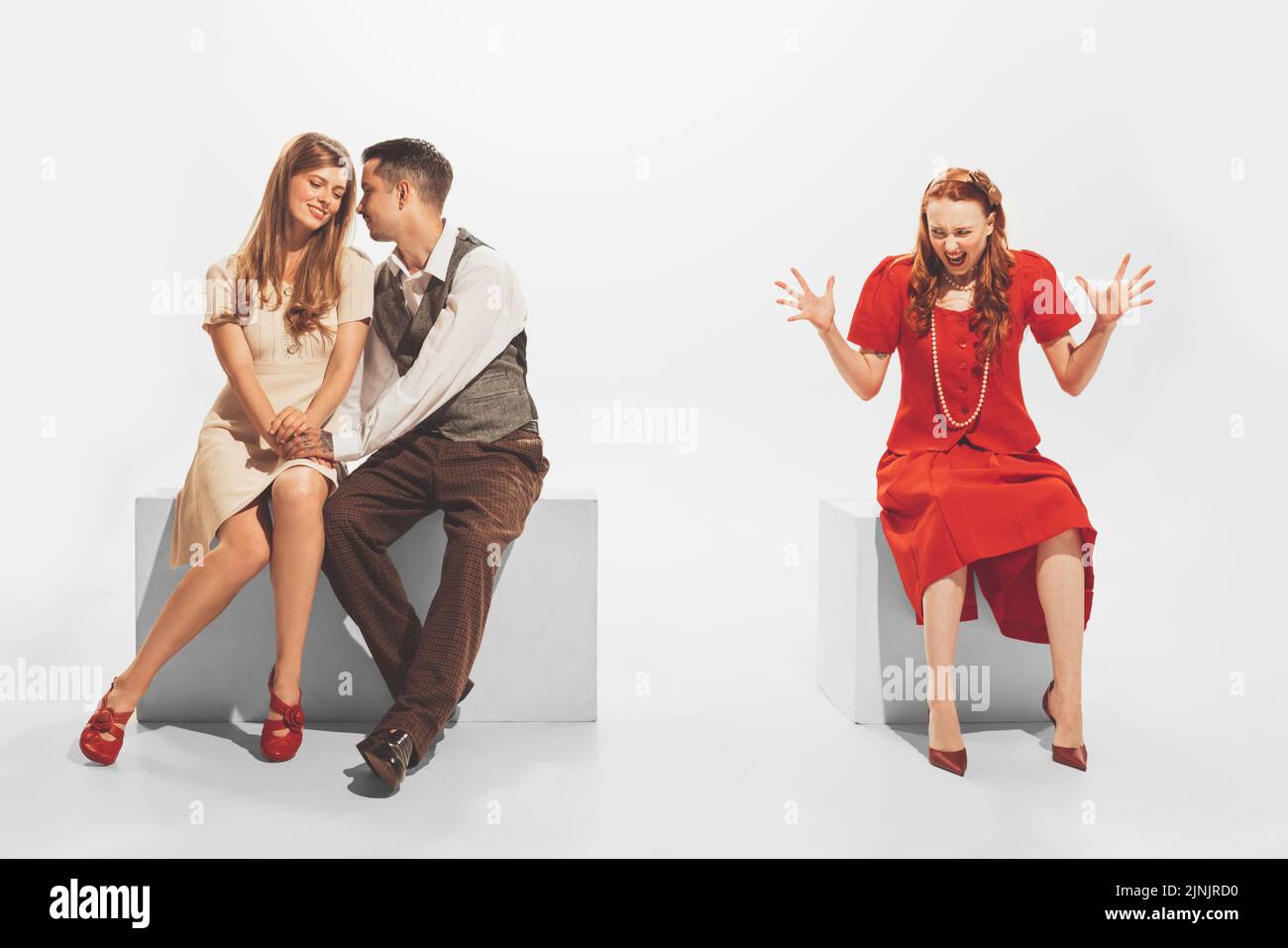 Portrait of young angry girl finding out man cheating her with another ...