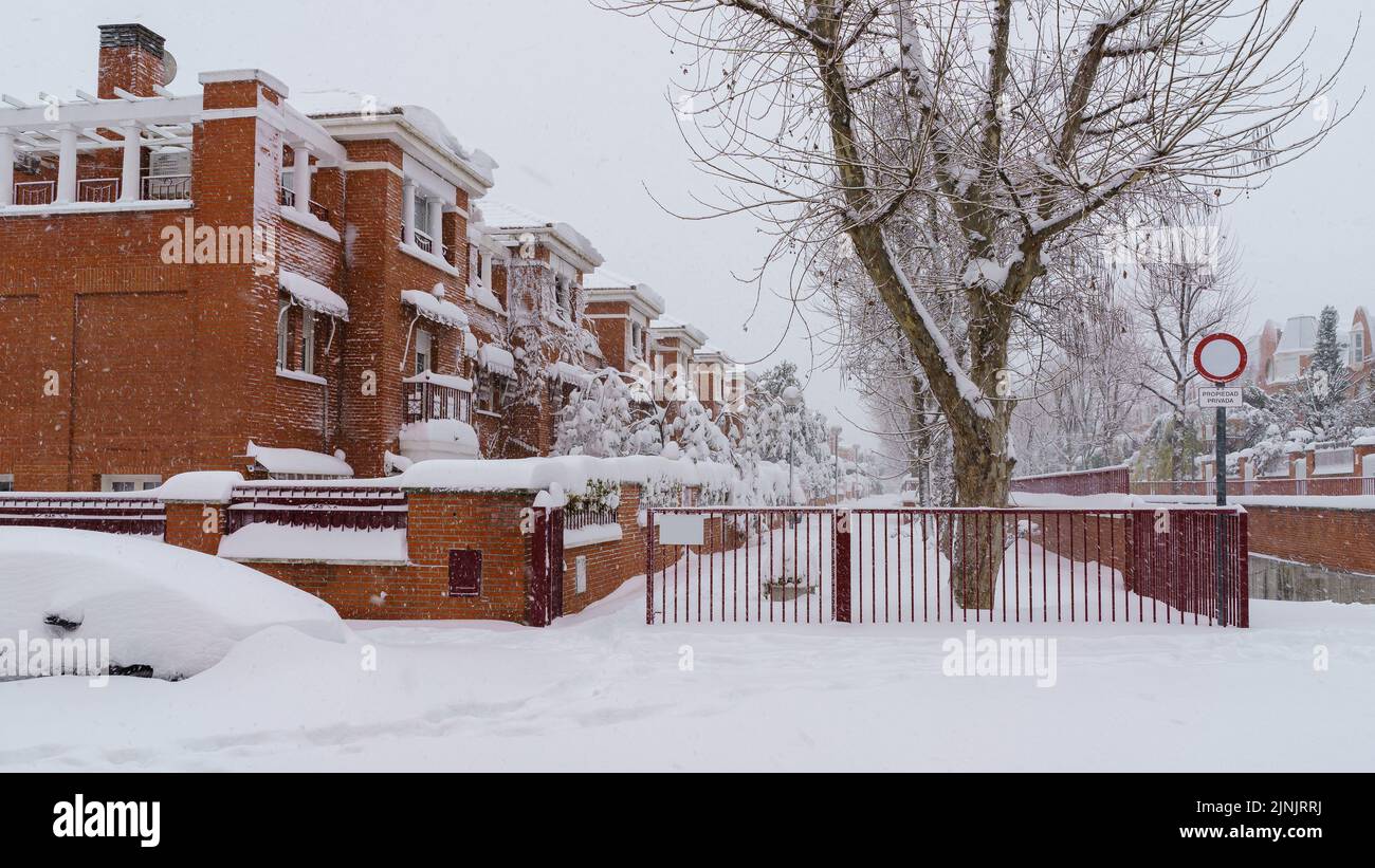 Streets and buildings covered in snow by day due to snowstorm Filomena ...