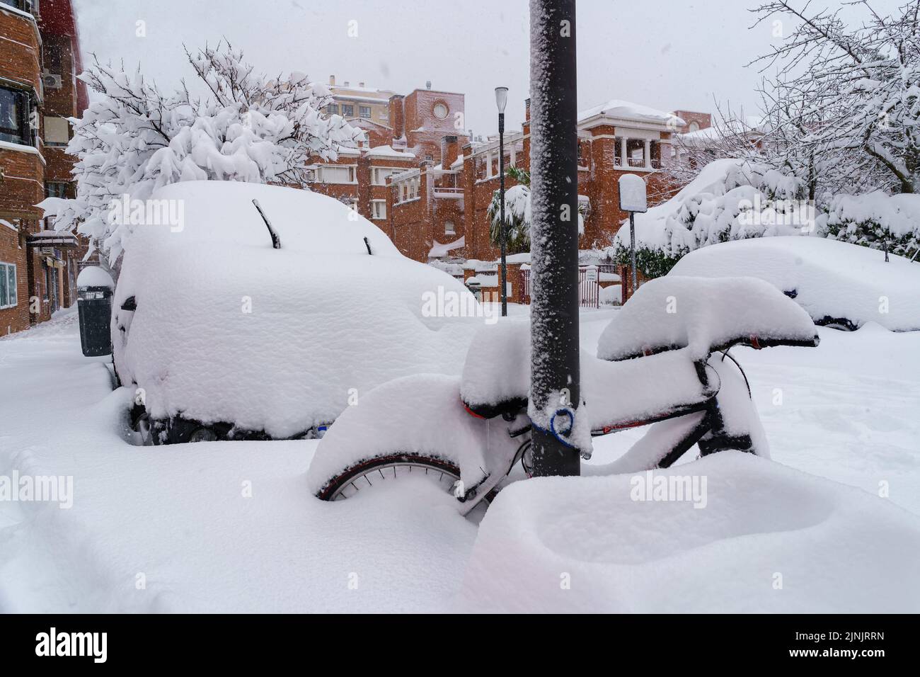 Streets and buildings covered in snow by day due to snowstorm Filomena ...