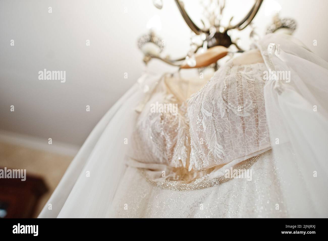 Wedding dress hanging ceiling hi-res stock photography and images - Alamy