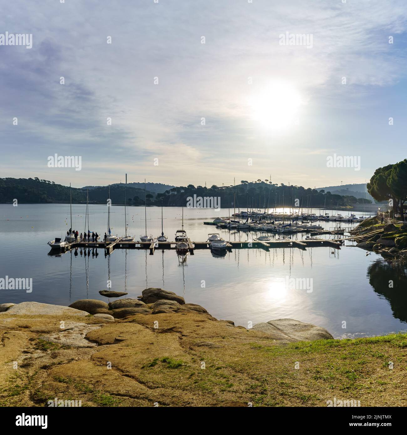 People learning to sail on a sailing boat with a teacher teaching the ...