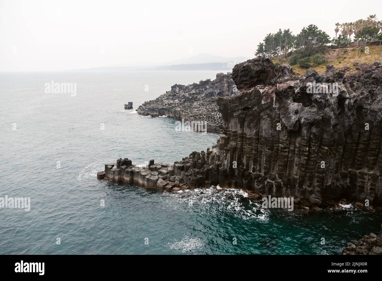 The Daepo Jusangjeolli Cliff on Jeju Island - the largest column rock ...