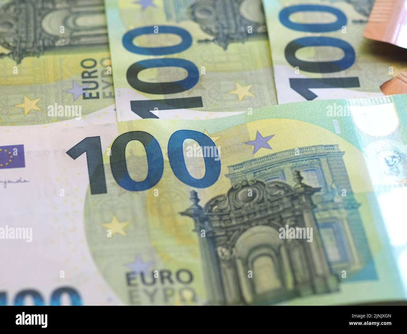 100 euro banknotes on a table Stock Photo - Alamy