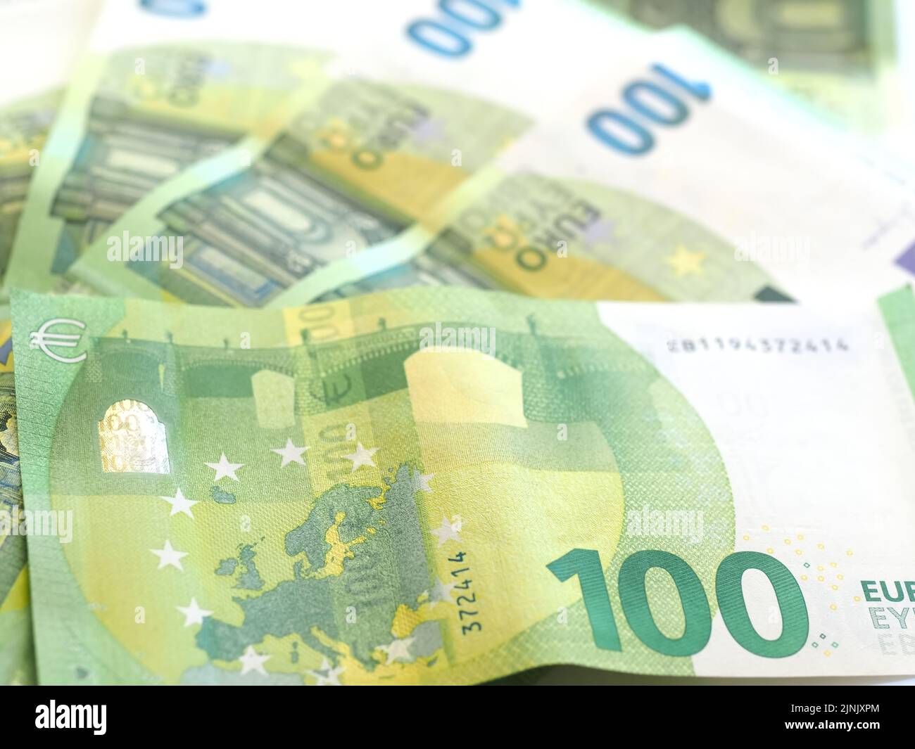 100 euro banknotes on a table Stock Photo - Alamy
