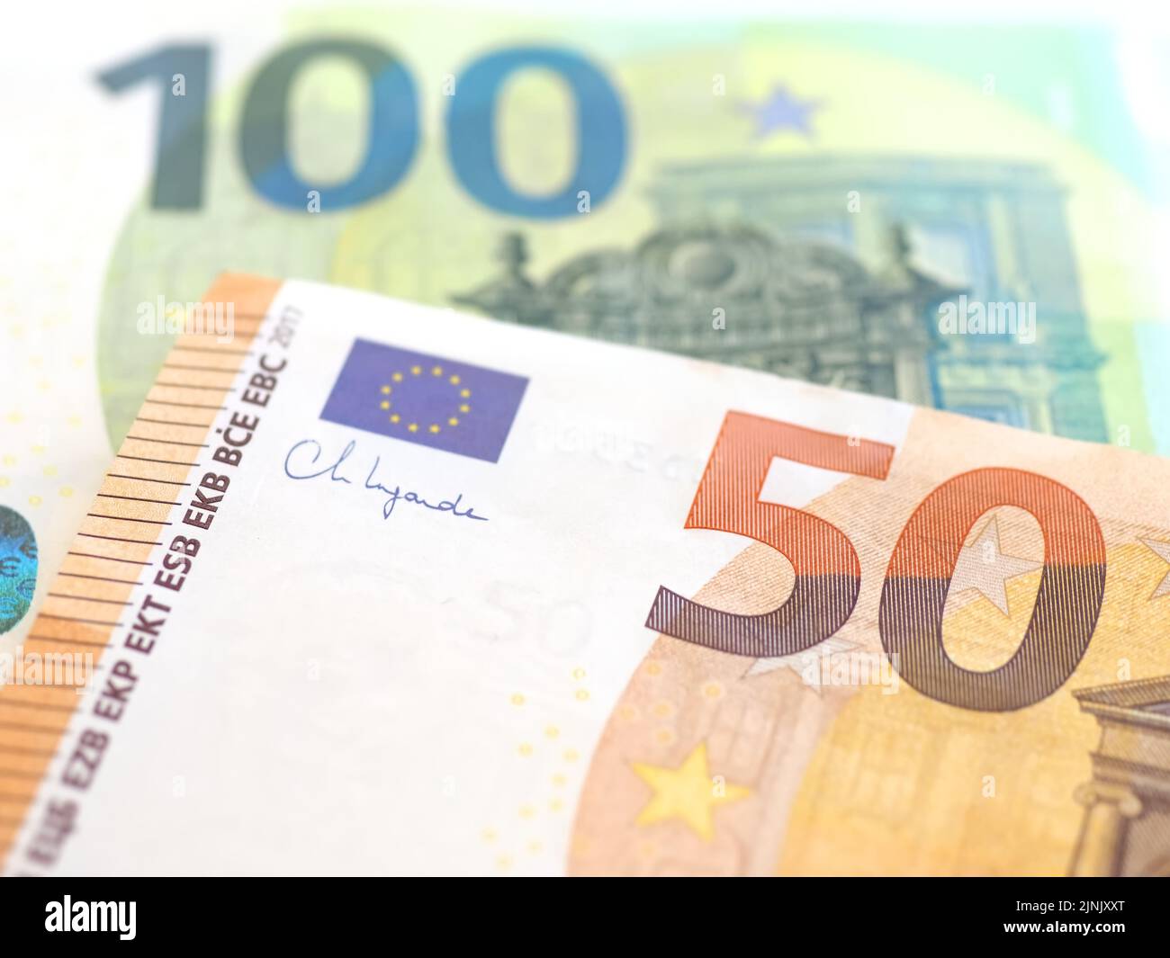 100 and 50 euro banknotes on a table Stock Photo - Alamy