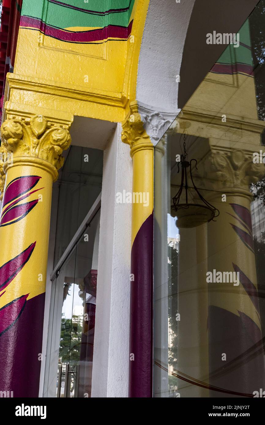 A view of columns of a building with colorful paints Stock Photo - Alamy