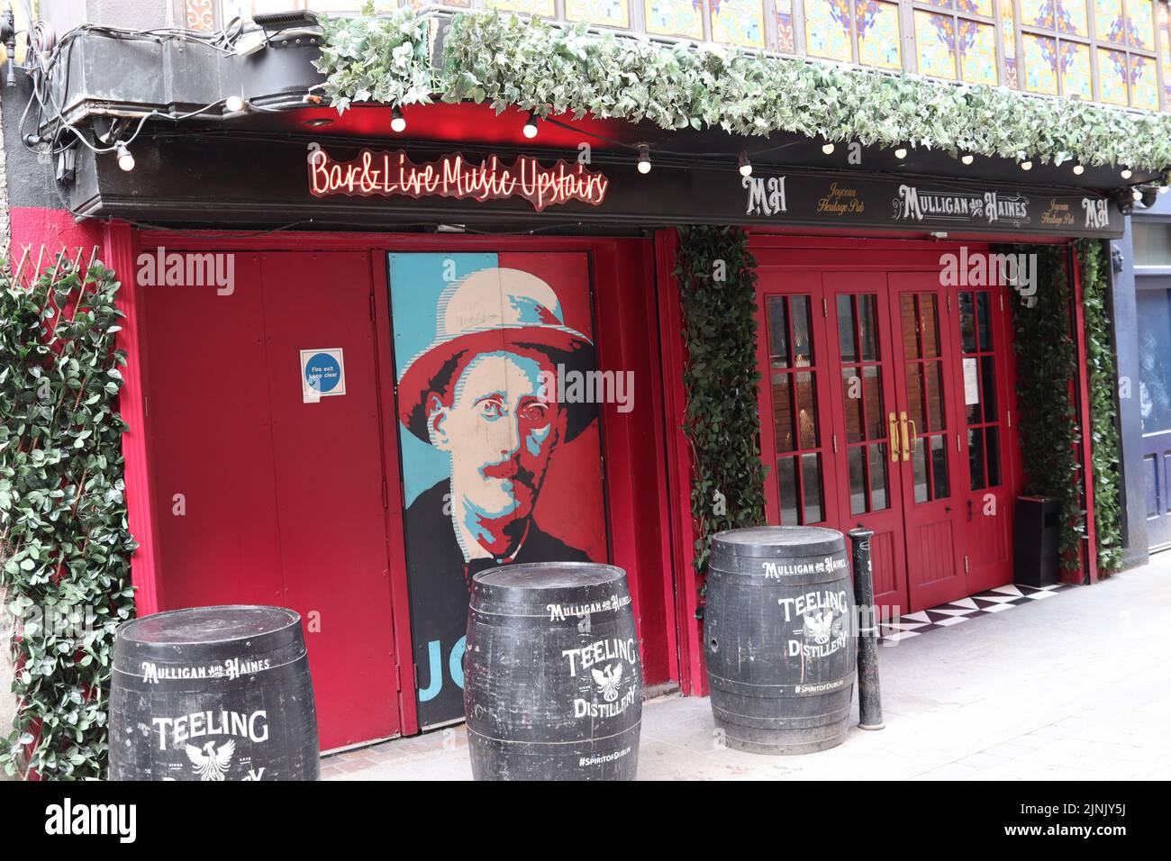 A view of an Irish pub with wooden cisterns outside in Dublin City ...