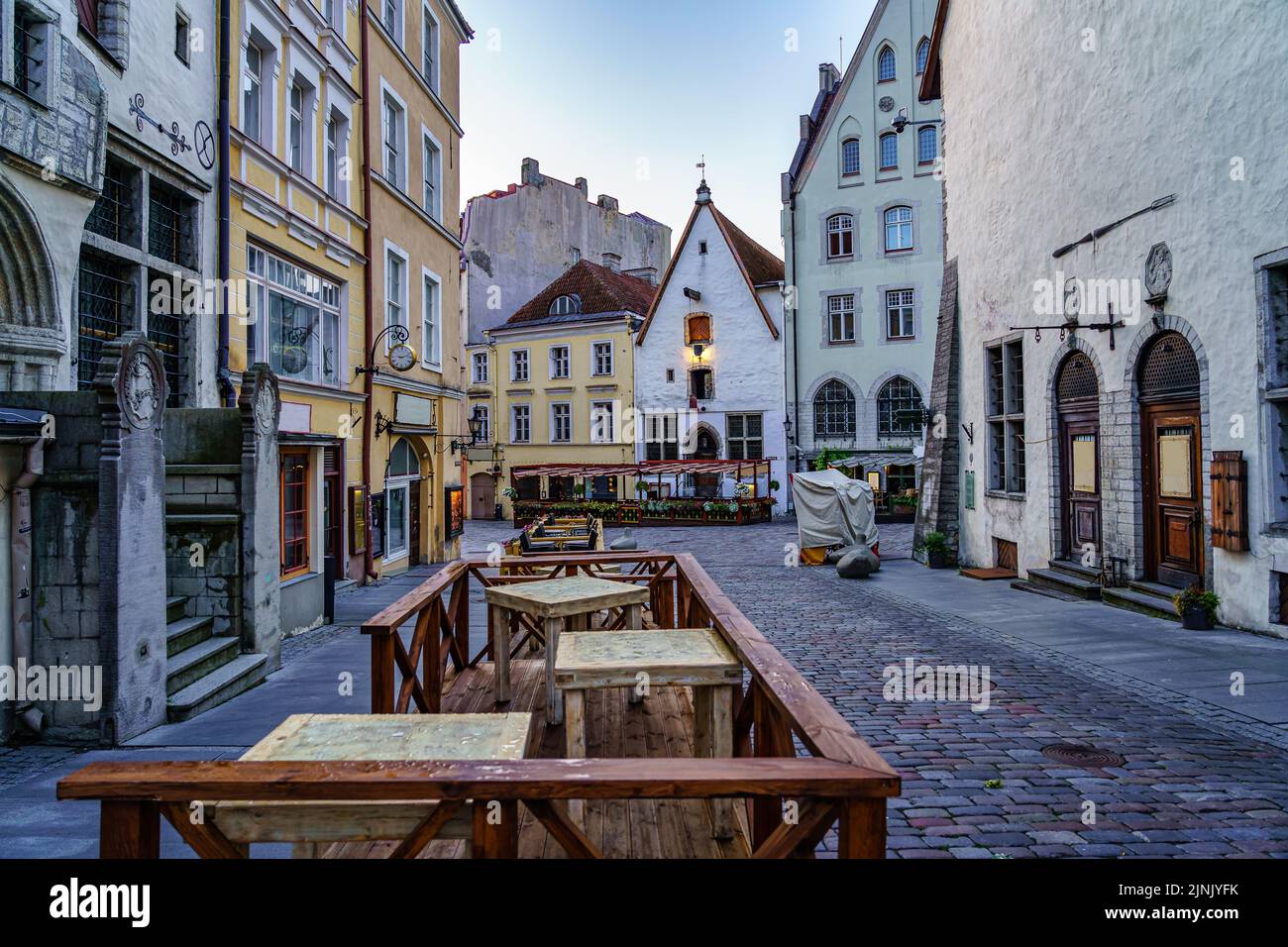 Street with medieval buildings of beautiful architecture. Tallinn ...