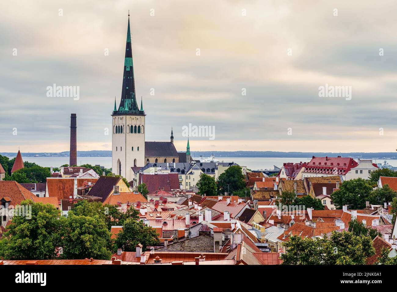 Aerial view of the city of Tallinn with its church towers at sunset ...