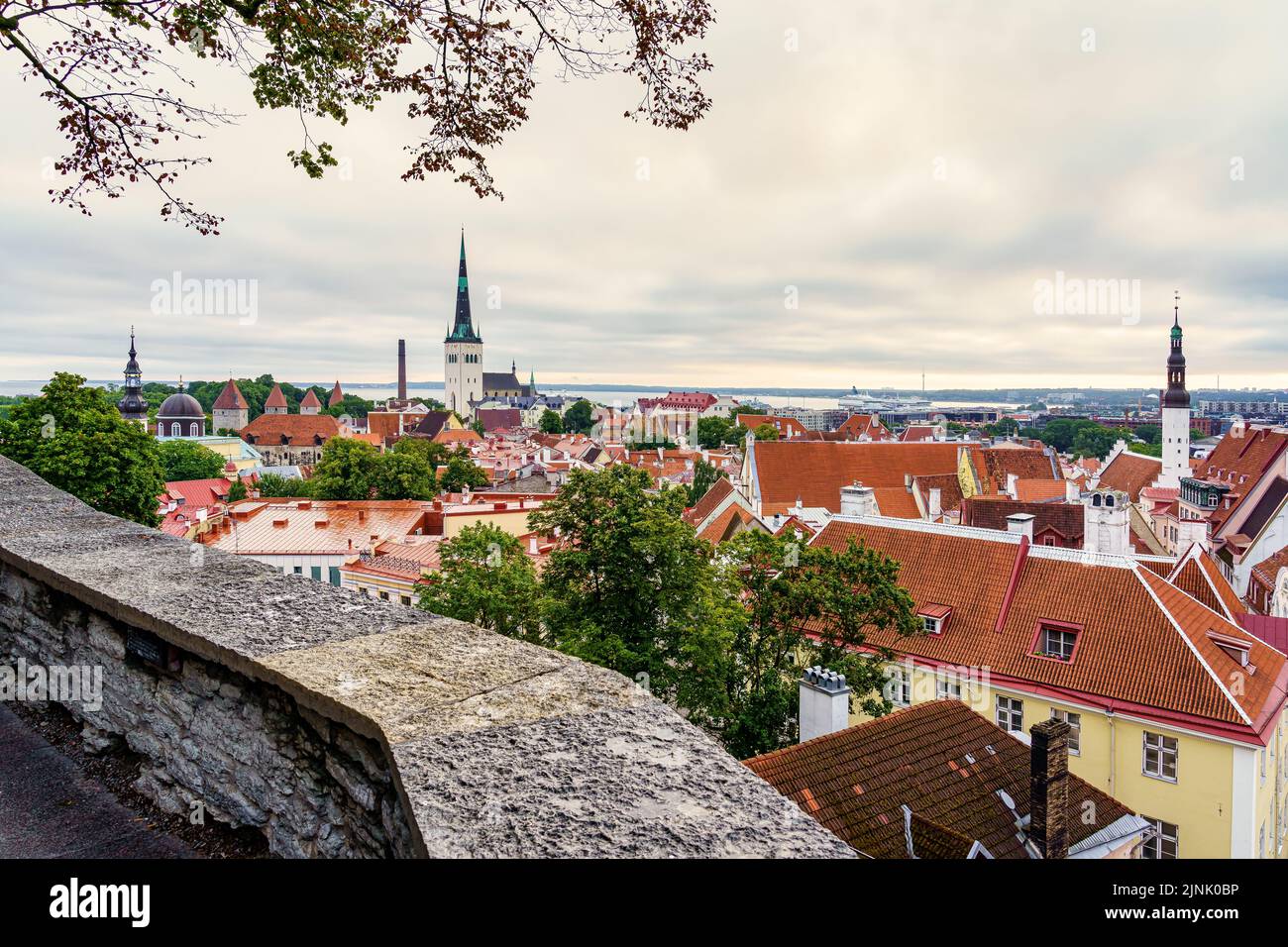 Aerial view of the city of Tallinn with its church towers at sunset ...