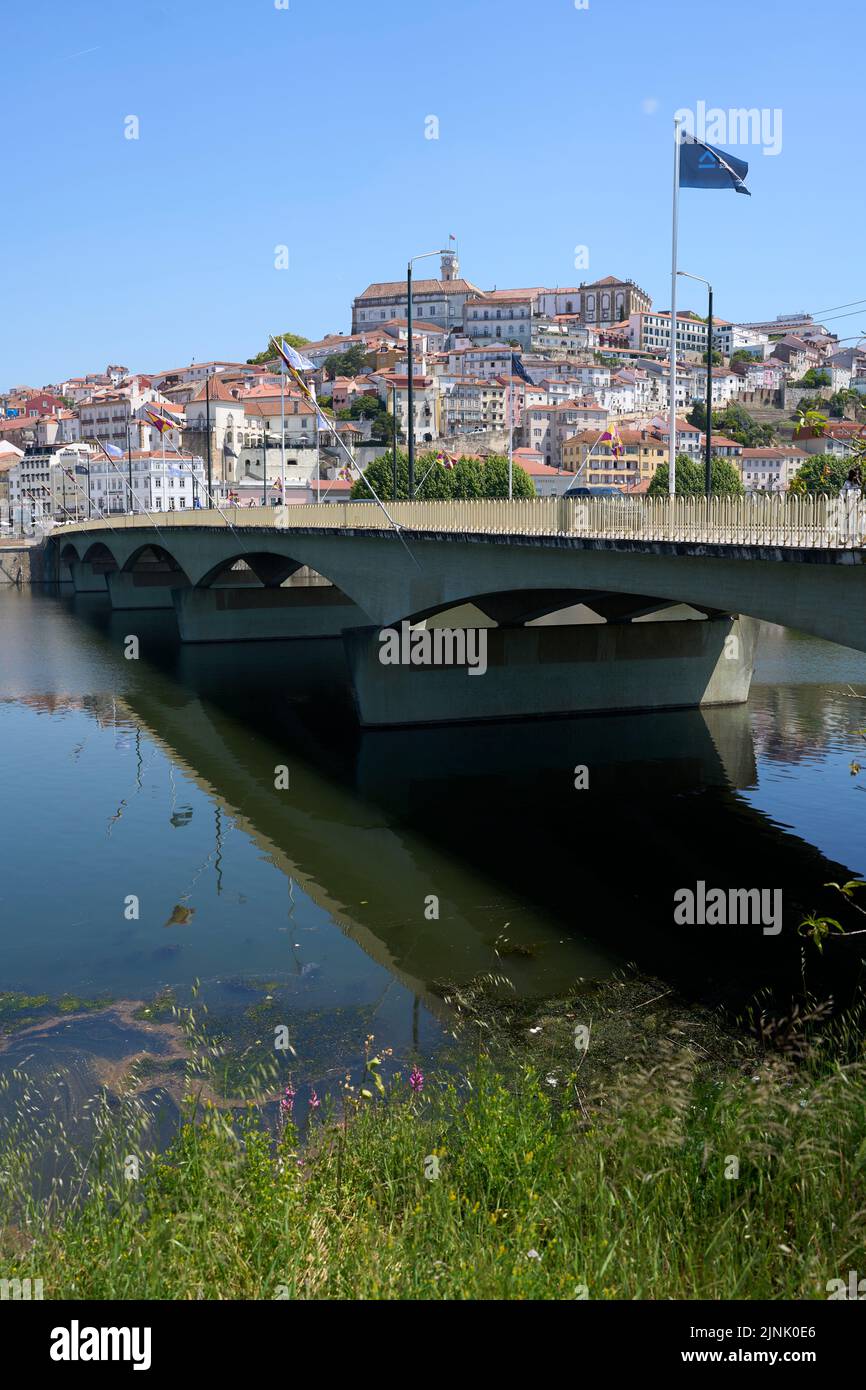 Santa Clara bridge above Mondego river in european Coimbra city in ...