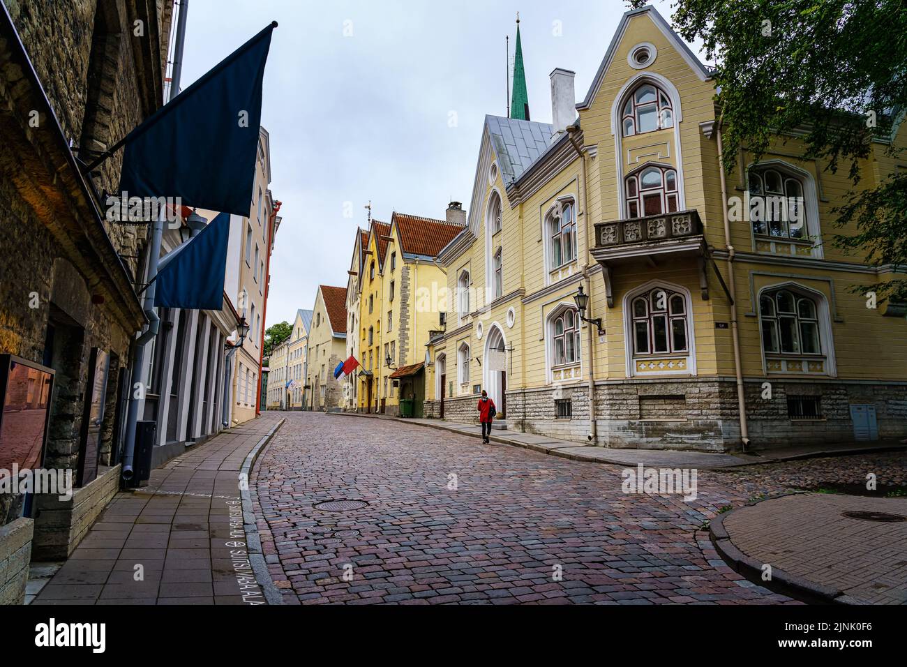 Beautiful cobbled street with its colorful medieval houses in the city ...