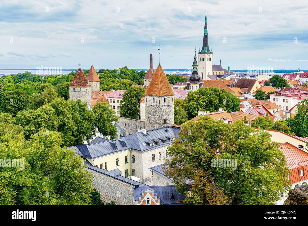 Aerial view of the city of Tallinn with its medieval towers and clouds ...