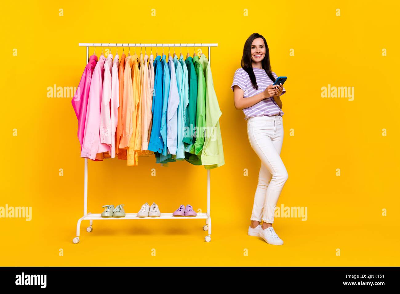 Full size photo of young attractive blogger lady hold phone promote her ...