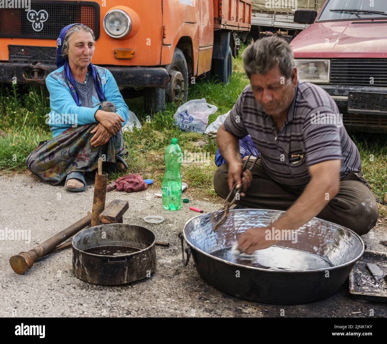 Man making fire retro hi-res stock photography and images - Alamy