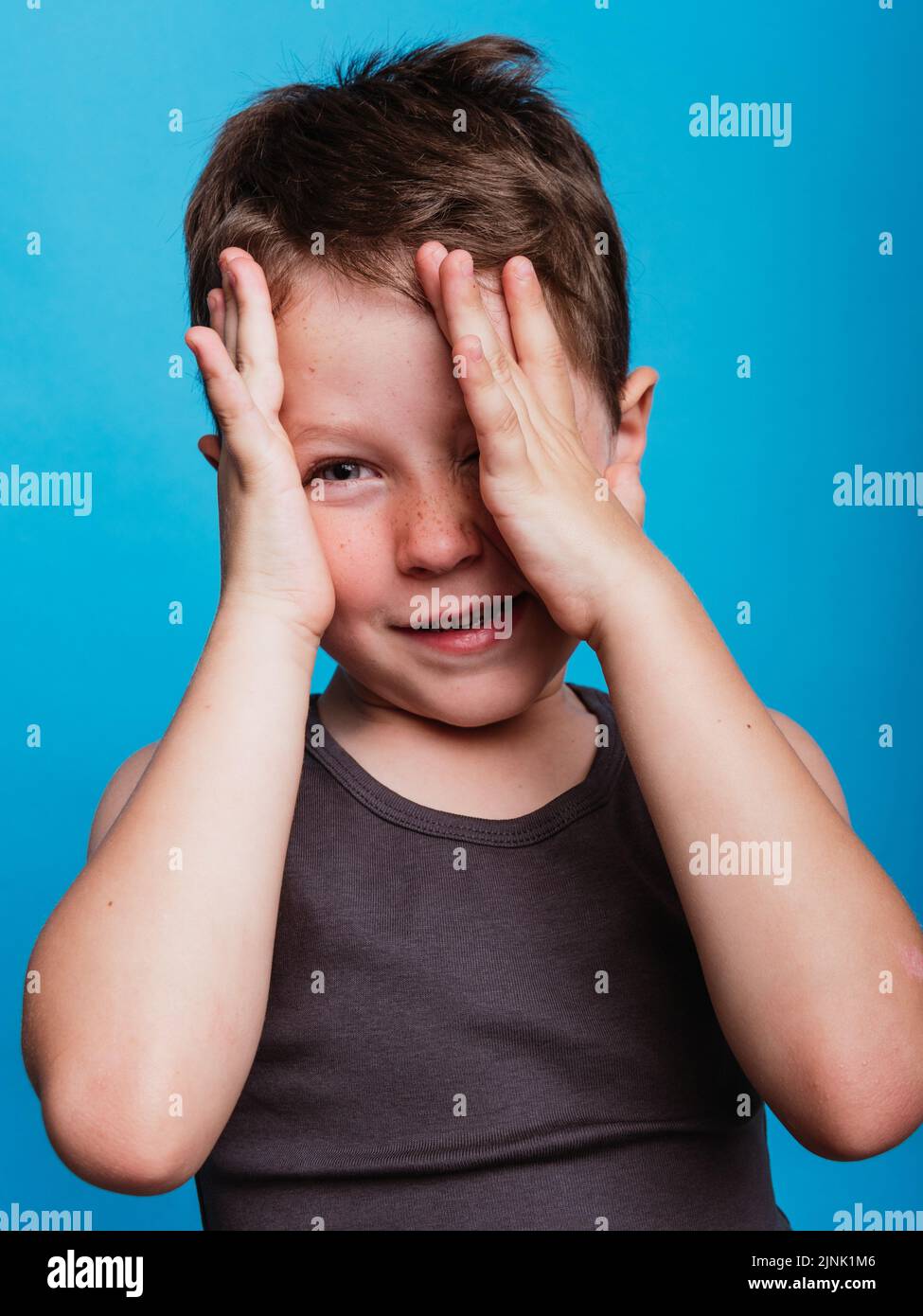 boy, shy, hide, boys, shies, hiding Stock Photo - Alamy