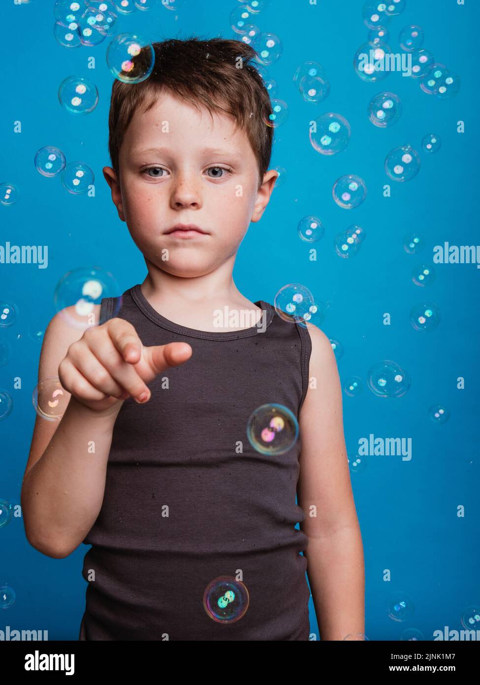 boy, serious, touching, soap bubble, boys, soap bubbles Stock Photo - Alamy