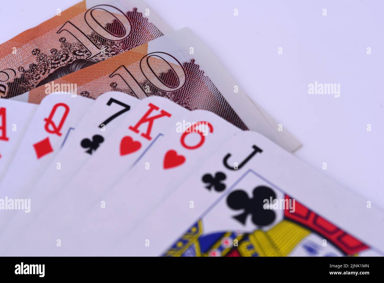 Playing cards and cash Stock Photo - Alamy