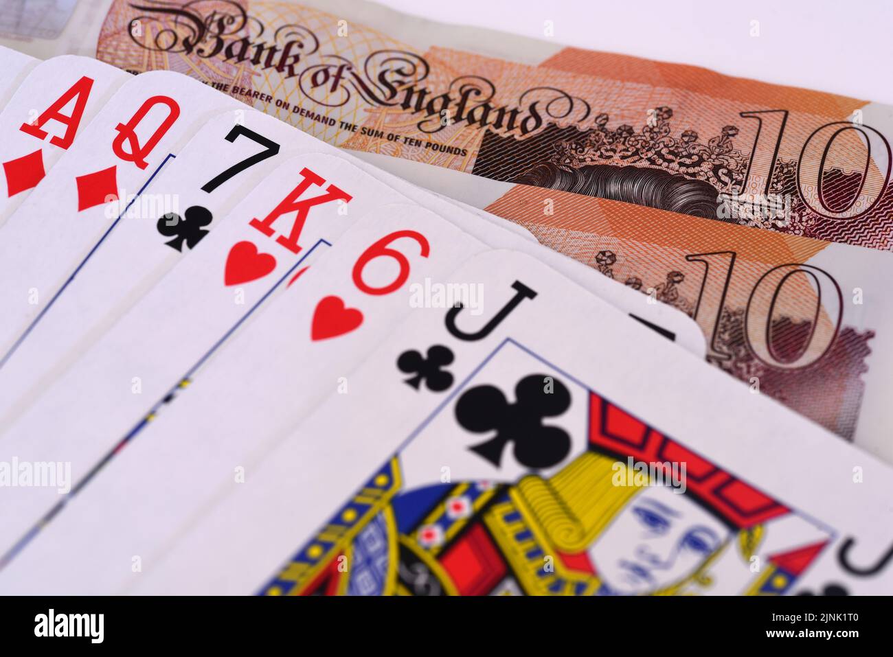 Playing cards and cash Stock Photo - Alamy