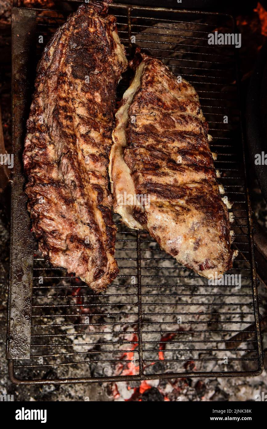 Roasted Crispy Ribs, traditional Argentinian barbecue Stock Photo - Alamy