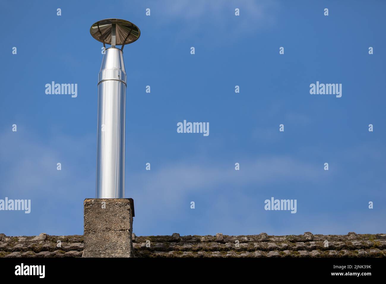 A steel pipe of roof chimney without smoke exhausts waste gas from ...