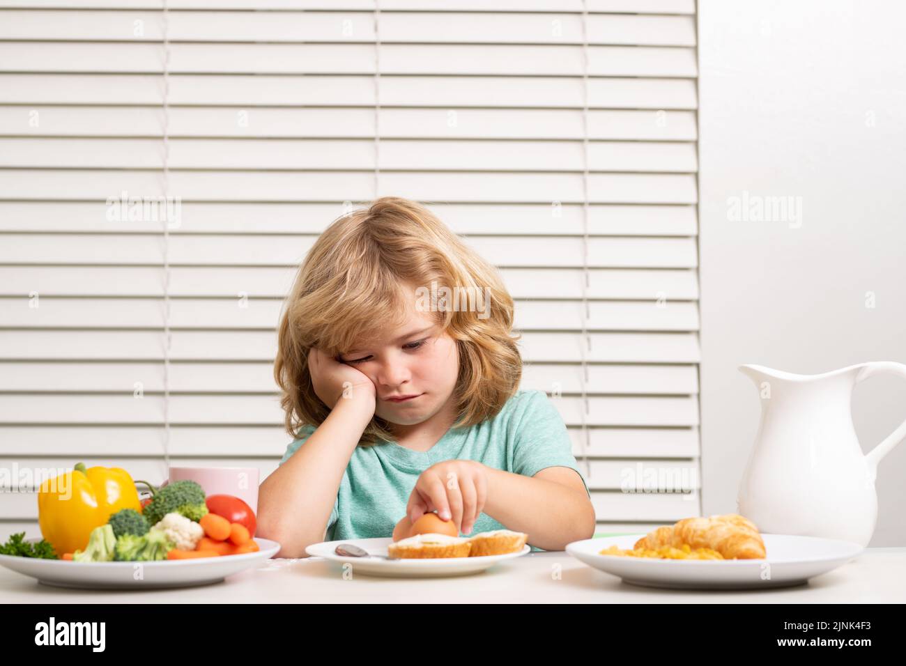 Portrait of kid with no appetite. Concept of loss of appetite. Child ...