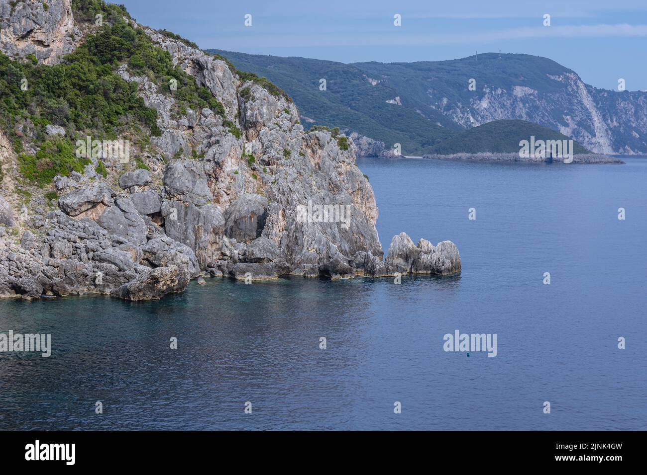 Rocky cape in Palaiokastritsa famous resort town on Greek Island of ...