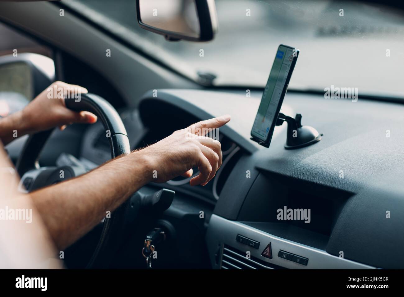 Navigator map in car vehicle transportation commuter. Driver man ...