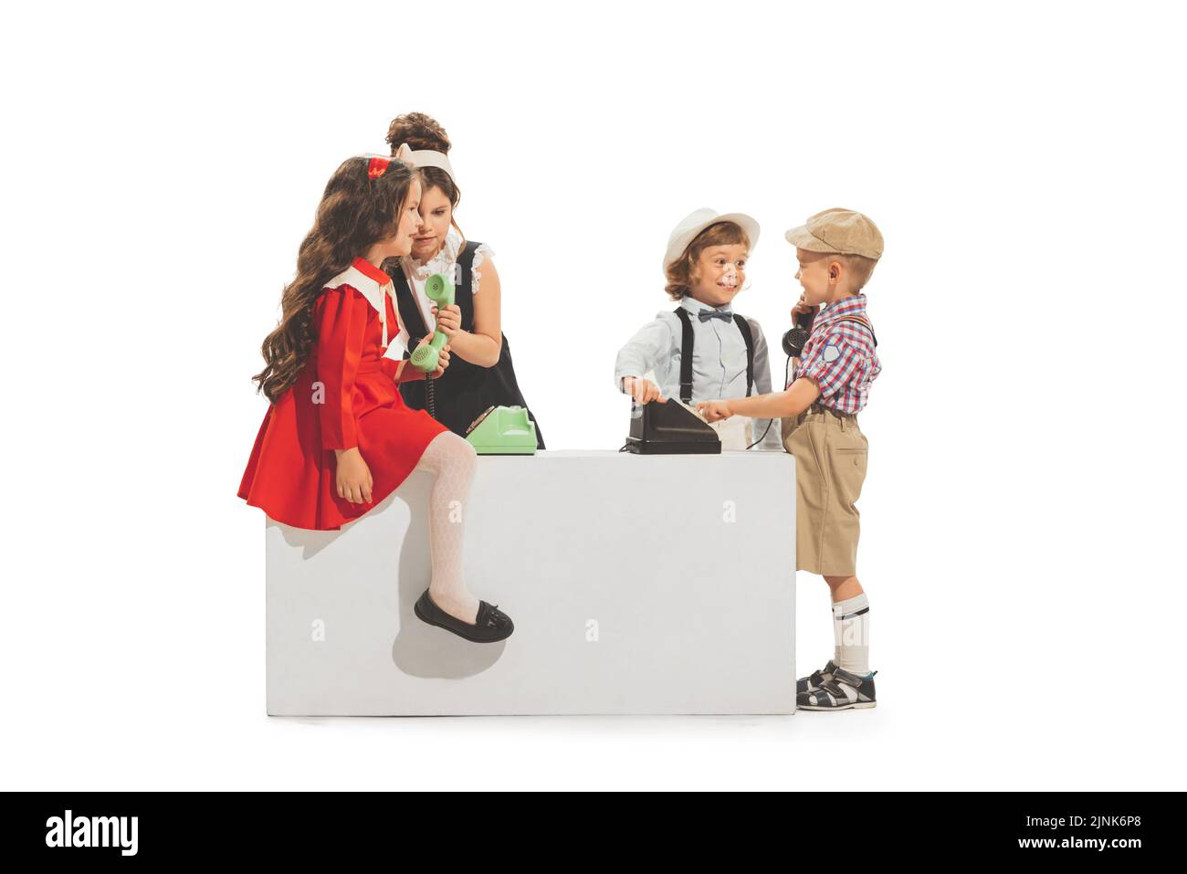 Group of cheerful kids, little boys and girls in retro style summer ...