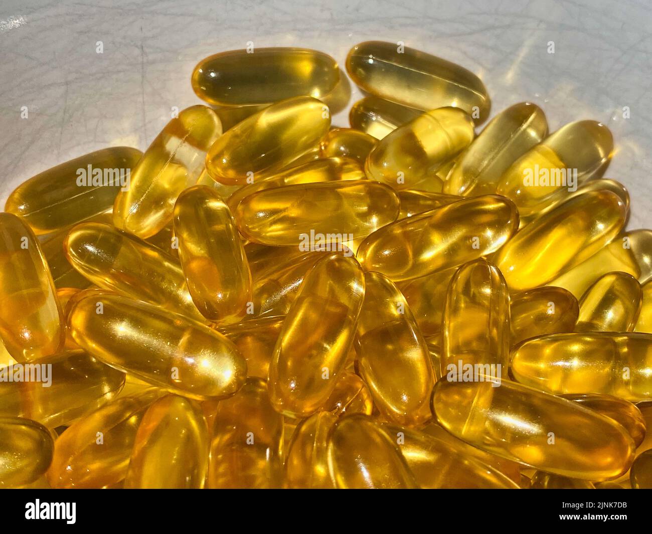 Cod liver fish oil capsules Stock Photo - Alamy