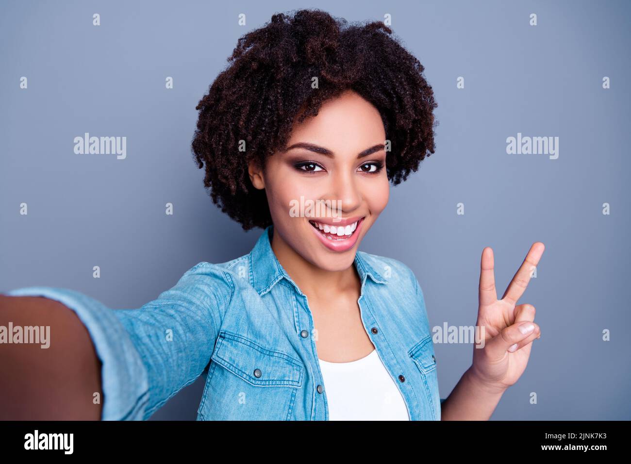 Portrait of cheerful charming lady take selfie hand fingers demonstrate ...