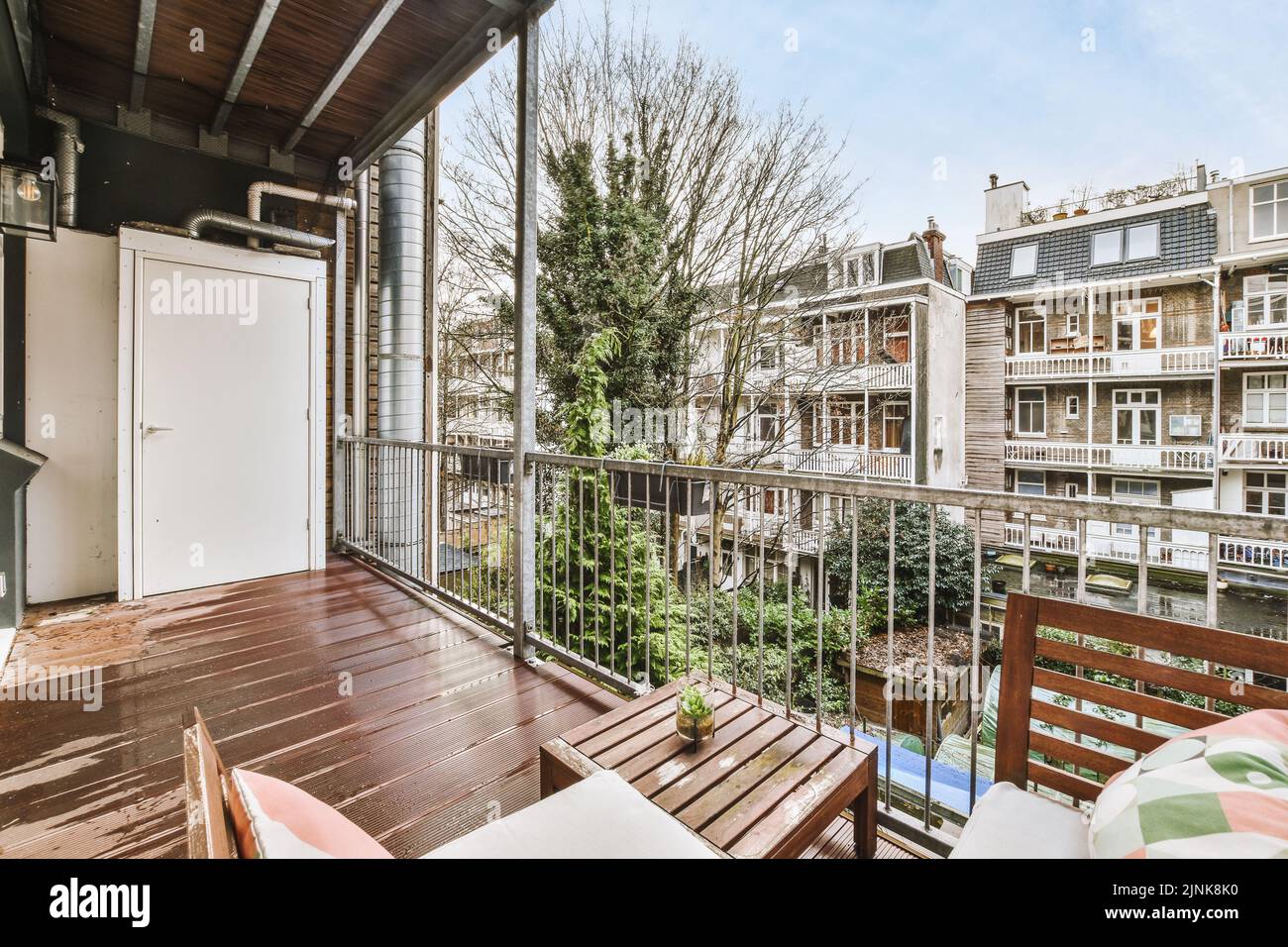 Front view of old buildings from small balcony with railings Stock ...