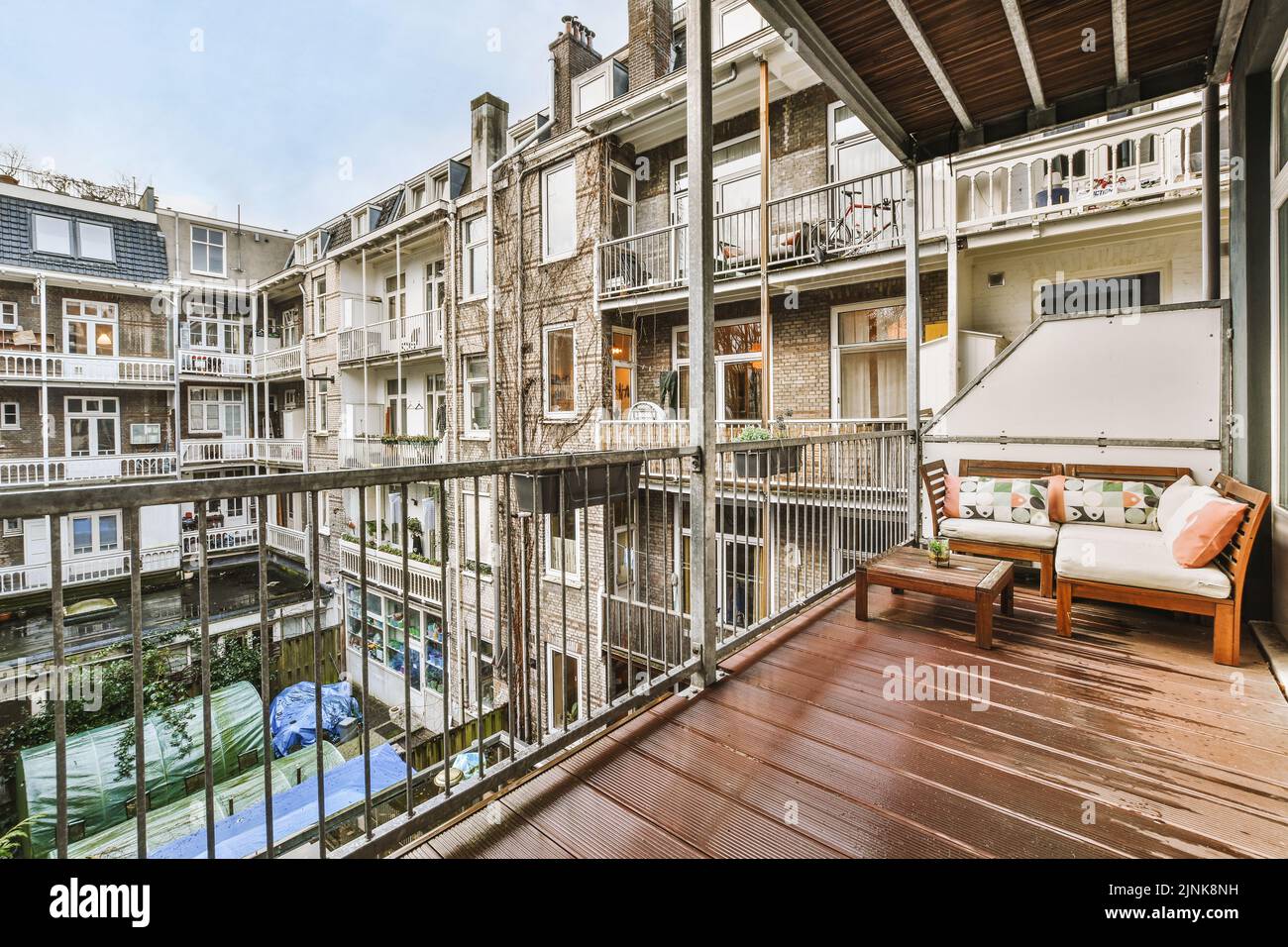 Front view of old buildings from small balcony with railings Stock ...
