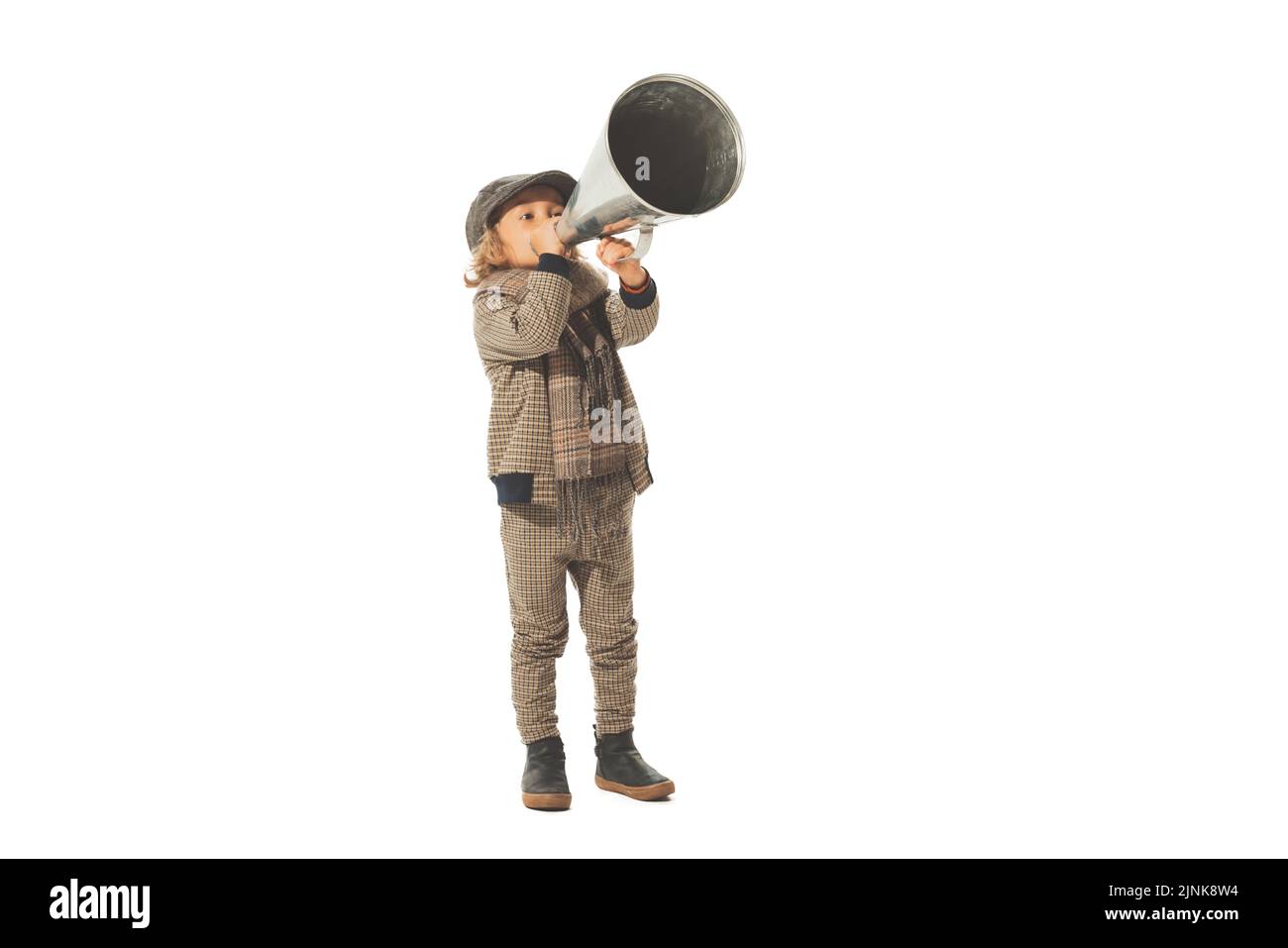 Stylish little kid shouting through vintage megaphone. Communication ...