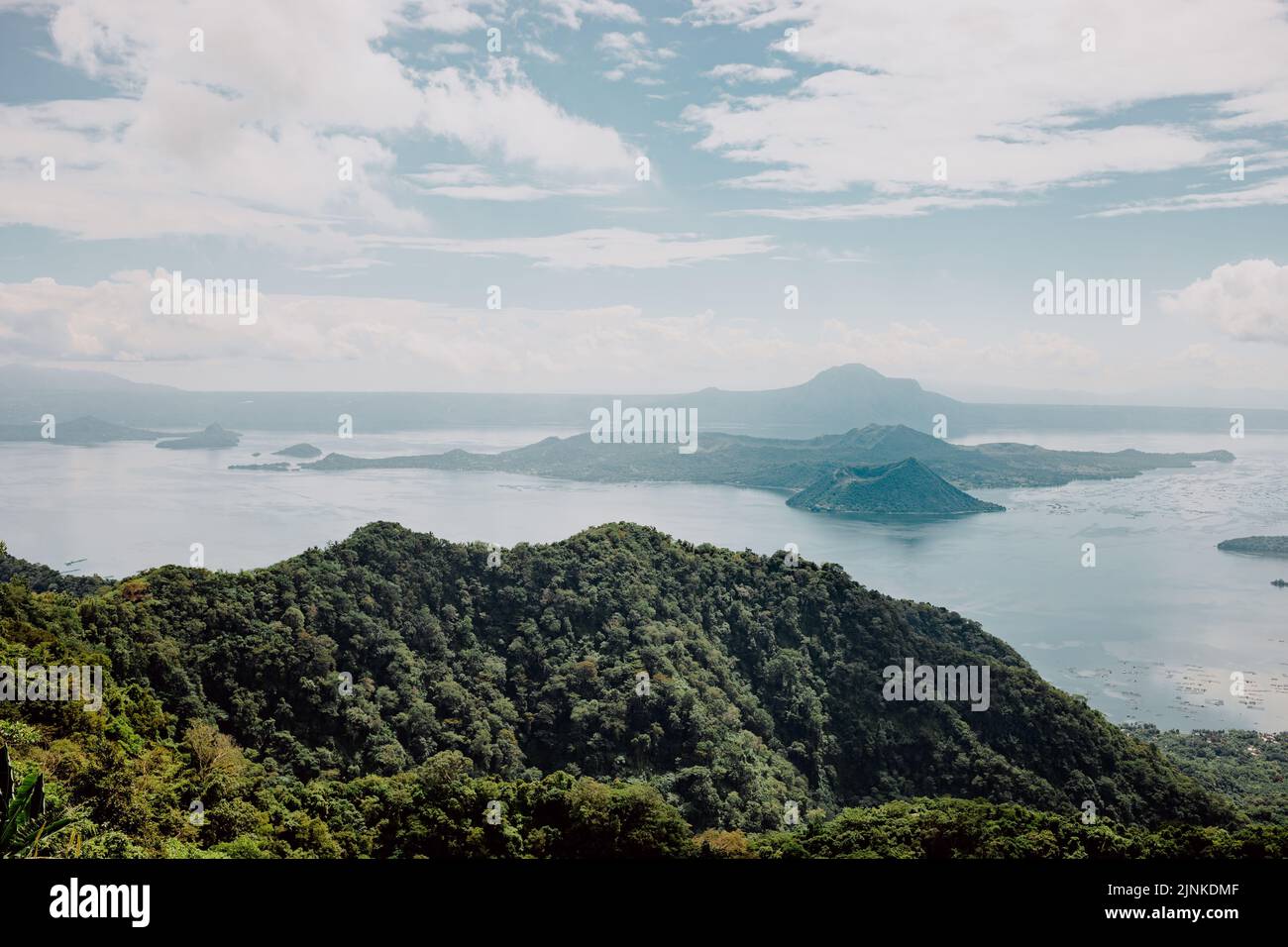 An aerial view of rocky cliffs over the water in Romblon in the ...