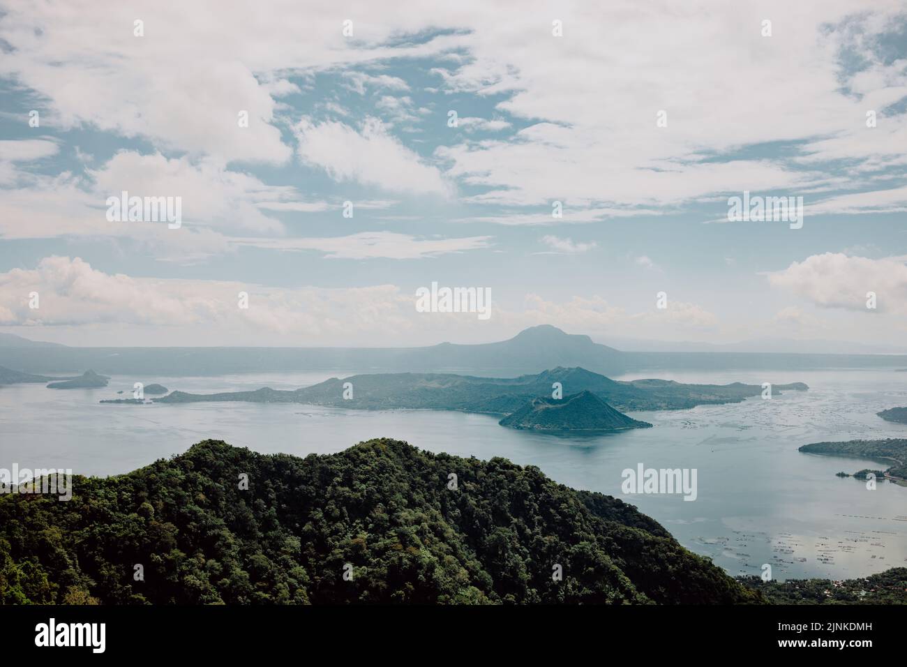 An aerial view of rocky cliffs over the water in Romblon in the ...