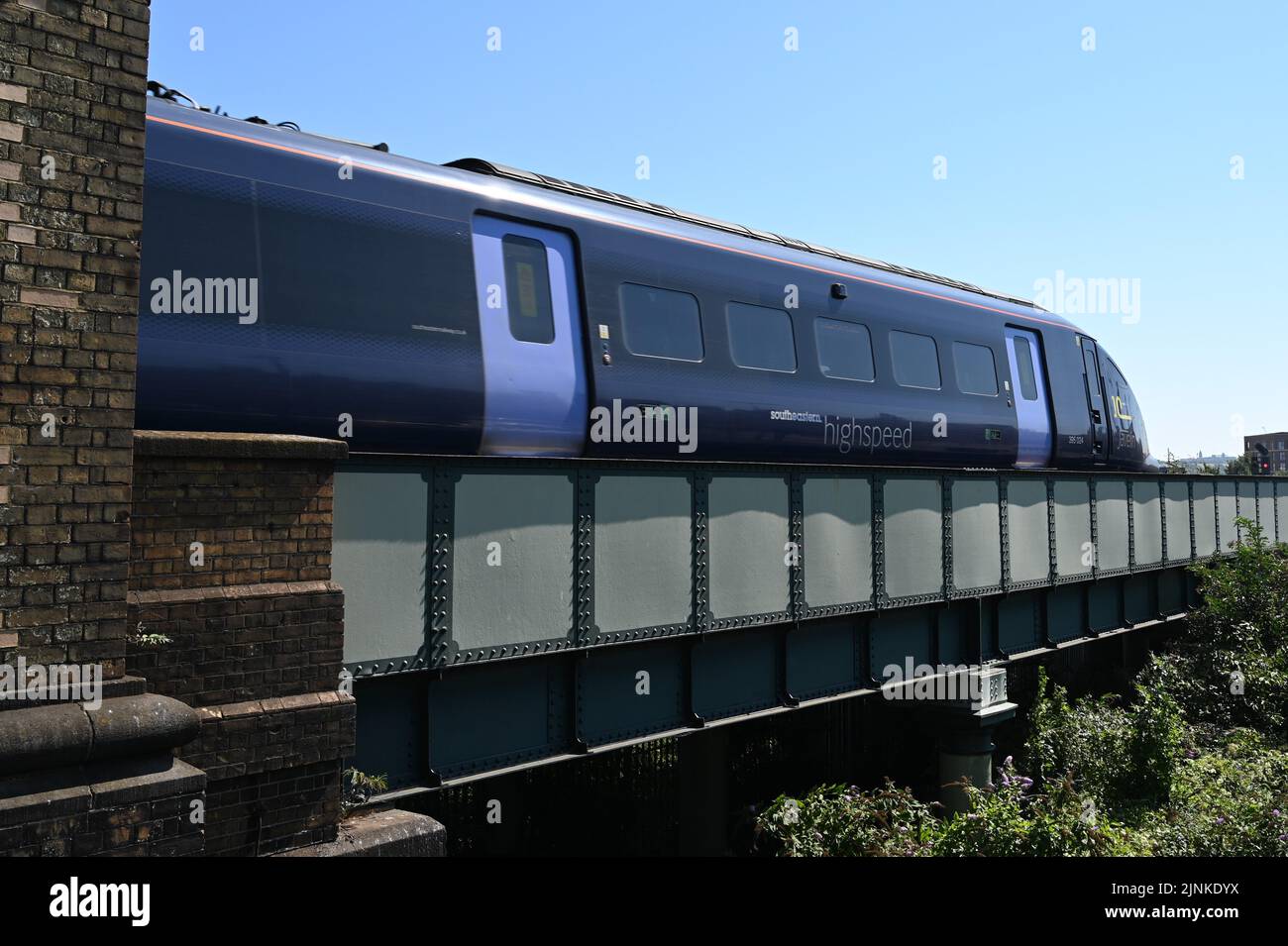 High speed train crossing the River Medway from Strood to Rochester in ...