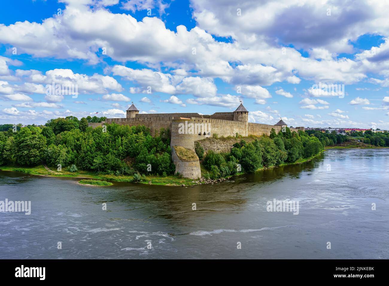 Aerial view of the castle next to the mouth of the river next to the ...