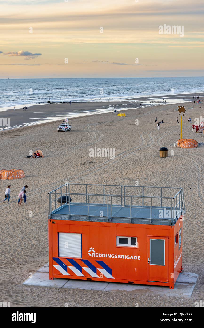 A vertical high-angle of a Dutch rescue brigade post on the beach ...