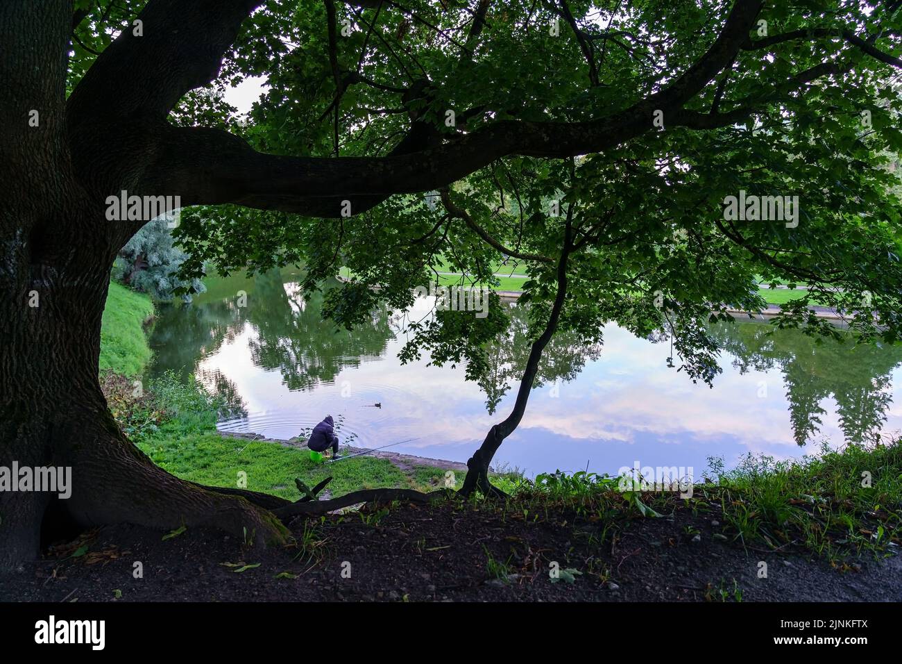 Beautiful lake landscape fisherman hi-res stock photography and images ...