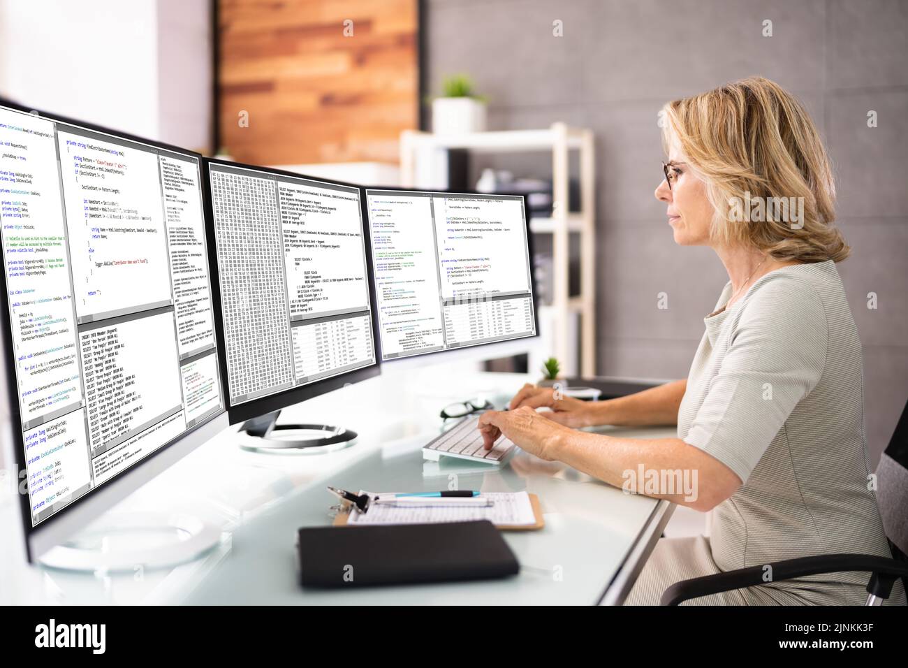 Work From Home On Multiple Computer Screen Stock Photo - Alamy
